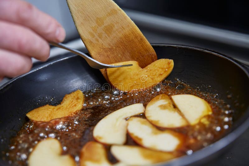 Close-up Shot of Caramelizing Apple Slices in a Pan Stock Image - Image ...