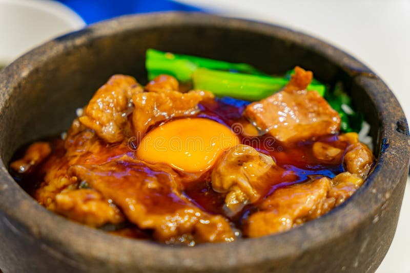 Close Up Shot of Claypot Rice with Raw Egg Stock Photo - Image of rice ...