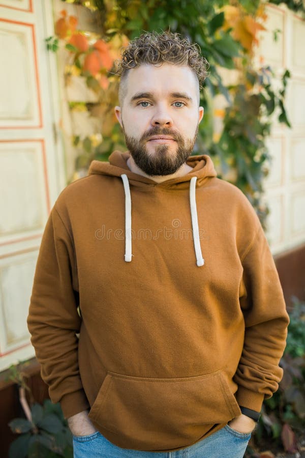 Close Up Shot of Curly European Male with Beard Wears Switshot Outdoors ... Close Up Shot of Curly European Male with Beard Wears Switshot Outdoors ...