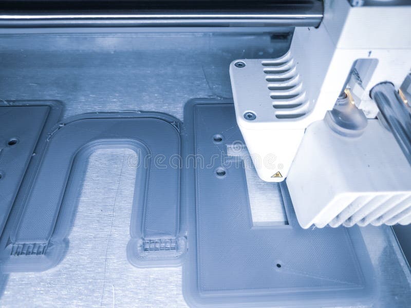 Close-up Shot of a 3D Printer with Plastic Wire Filament in Additive ...