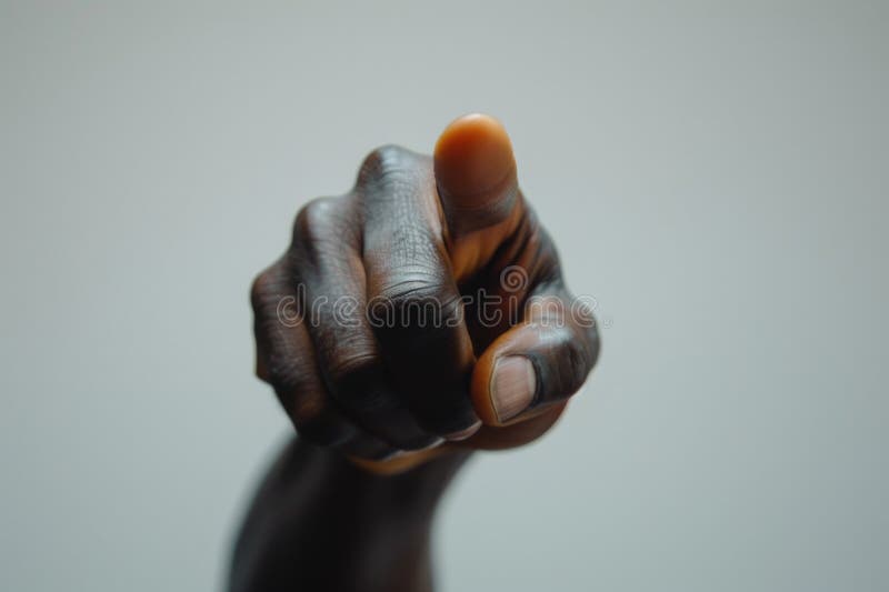 Close-Up of Dark Skinned Hand Pointing Forward for Guidance or ...