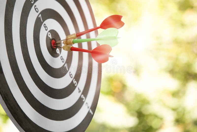 Close Up Shot of the Dart Arrow Hit on Bullseye, Red Dart Arrow Hitting ... Close Up Shot of the Dart Arrow Hit on Bullseye, Red Dart Arrow Hitting ...