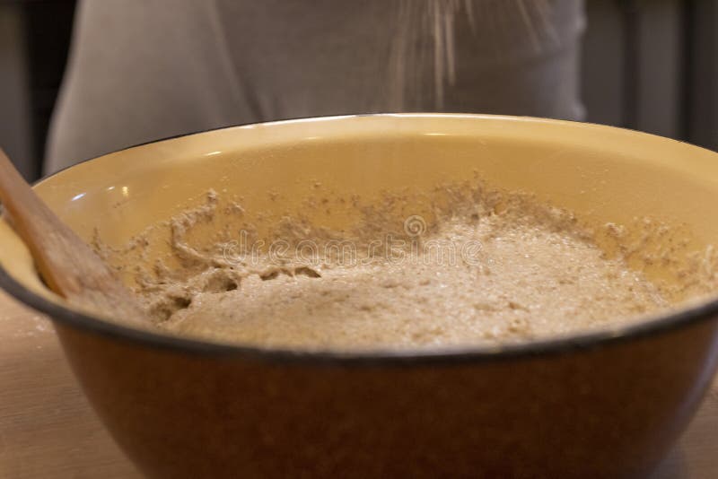 Close Up Shot of the Dough in the Bawl on the Kitchen Counter Top ...