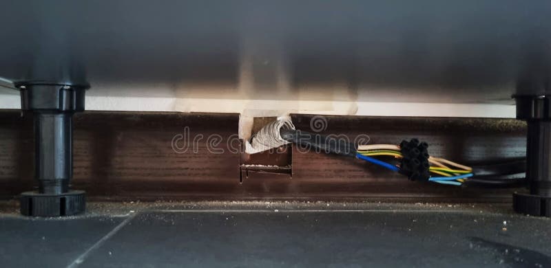 Close Up Shot of Electric Connection Under the Cabinet. Safety Stock ...