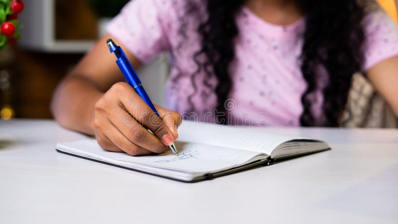 Close Up Shot of Girl Hands Writing or Making Notes on Study Desk at ...