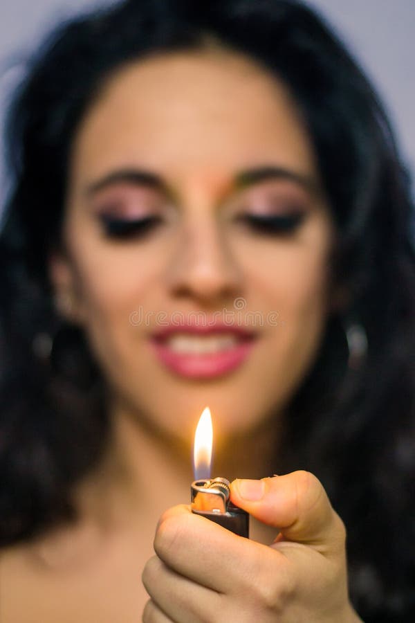 Close Up Shot of a Girl with a Lighter Stock Image - Image of smoking ...