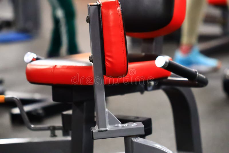 A Close-up Shot of a Gym Bench Featuring a Distinctive Red Seat Stock ...
