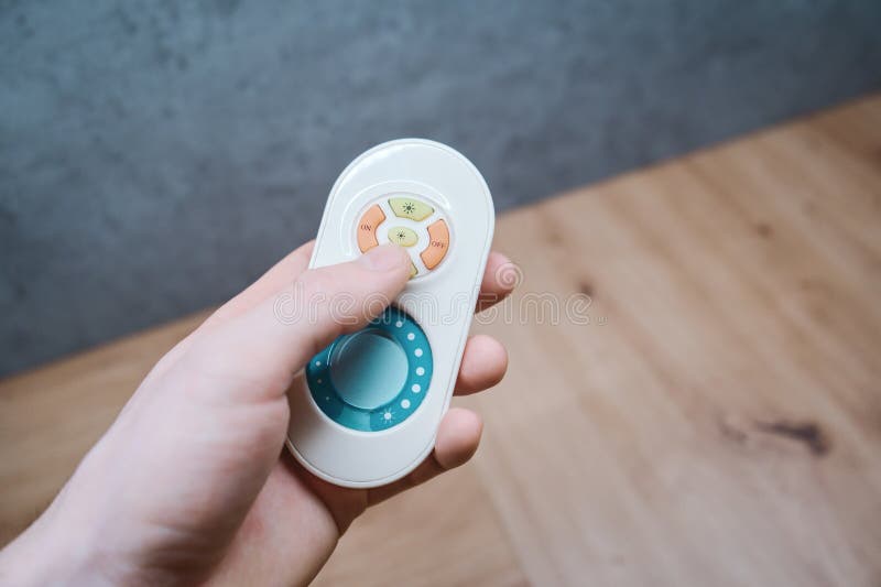 Hand Holding Smart Remote Control Led Lighting Stock Photos - Free ...