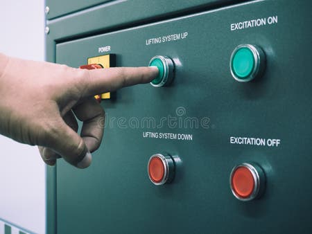 Close-up Shot Hand Presses Power Button on Industrial Machine Control ...