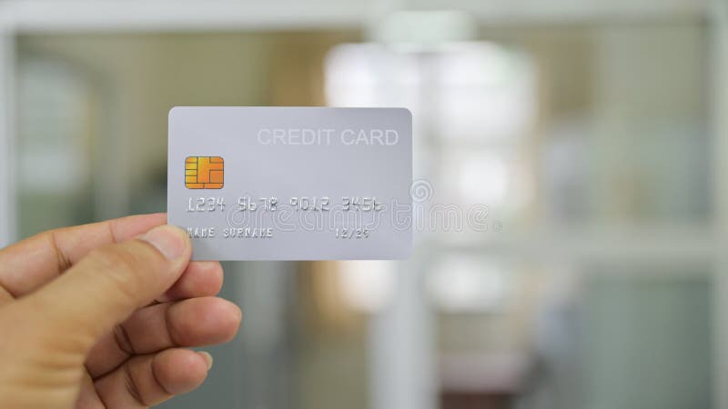 Close - Up Shot of Hand Showing Credit Card Stock Photo - Image of ...