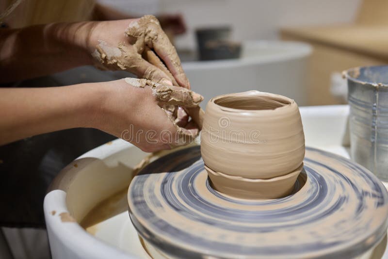 Close Up Shot of Hands of Crafts People, Working with Clay in Pottery ...