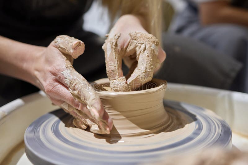 Close Up Shot of Hands of Crafts People, Working with Clay in Pottery ...