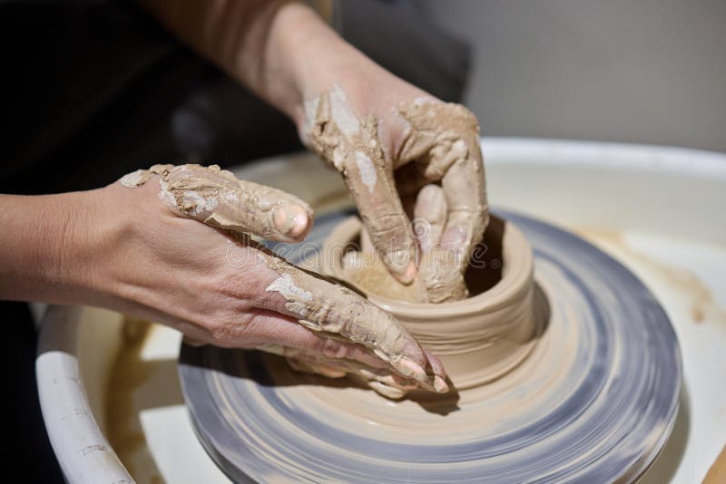 Close Up Shot of Hands of Crafts People, Working with Clay in Pottery ...