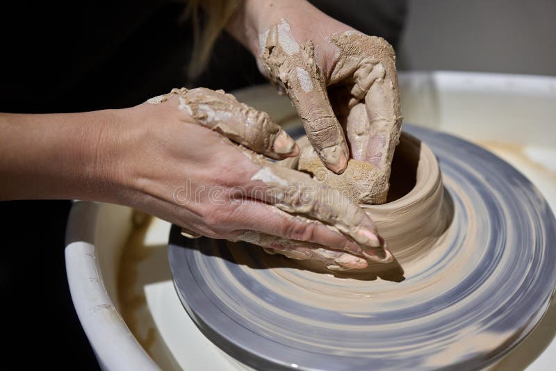 Close Up Shot of Hands of Crafts People, Working with Clay in Pottery ...
