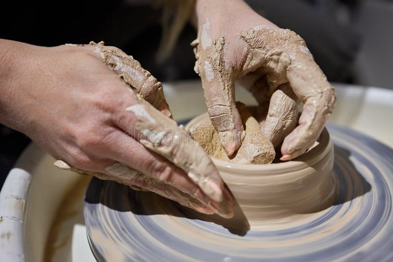 Close Up Shot of Hands of Crafts People, Working with Clay in Pottery ...