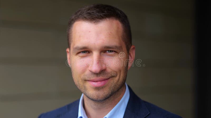 Close Up Of Happy Handsome Man Looking At Camera And Smiling In Good