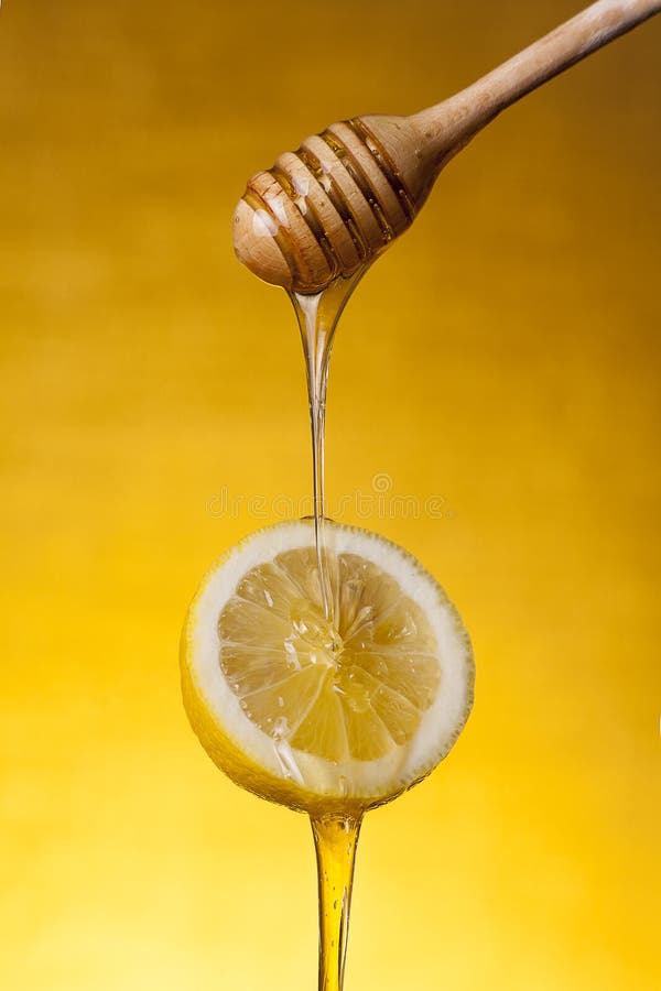 Close-up Shot of Honey Flowing on Lemon Stock Image - Image of citrus ...