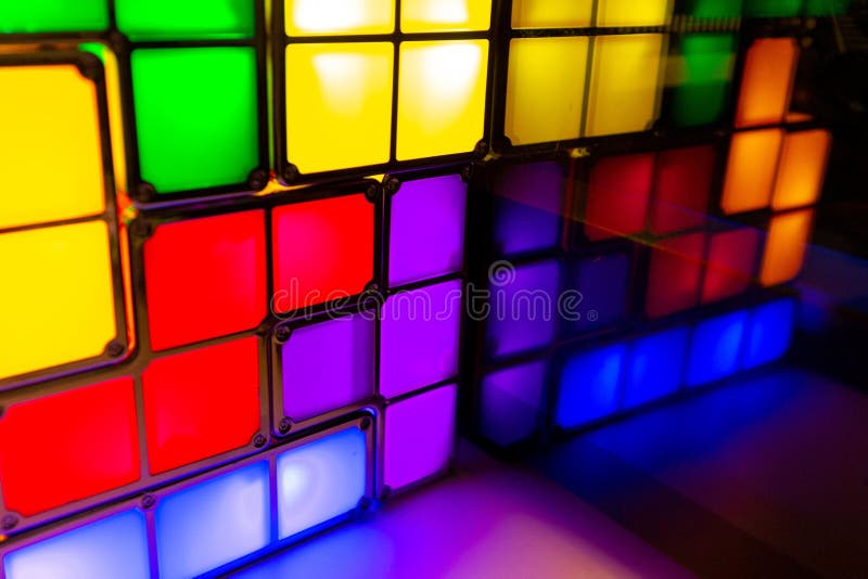 Close-up Shot of Illuminated Colorful Blocks Reflecting in a Mirror ...