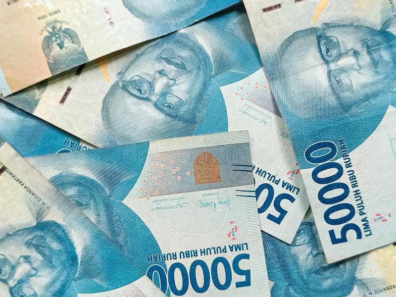 A Close-up Shot of Indonesian 50,000 Rupiah Banknotes Spread Randomly ...