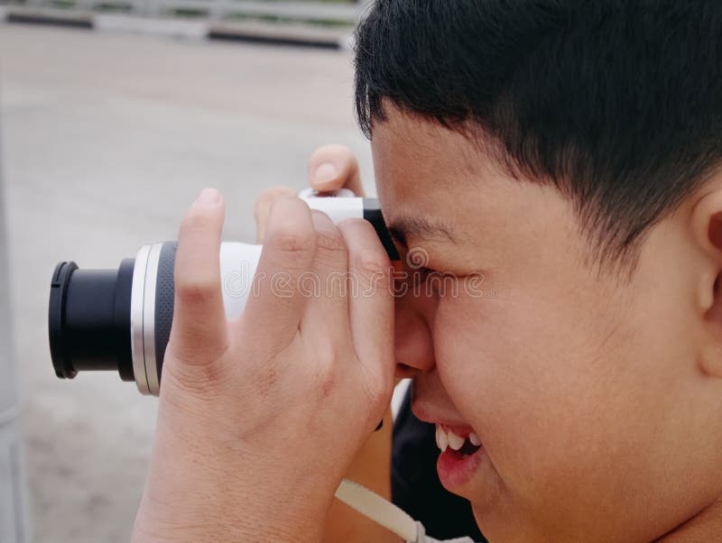Close-up Shot of Kid Taking Photos with Mirrorless Camera Stock Image ...