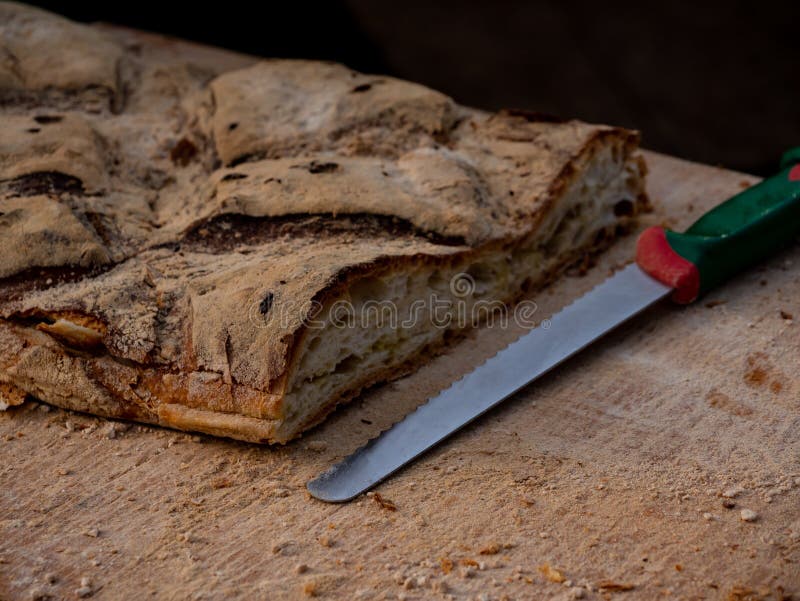Close-up Shot Knife with Cut Bread on a Table Stock Image - Image of ...