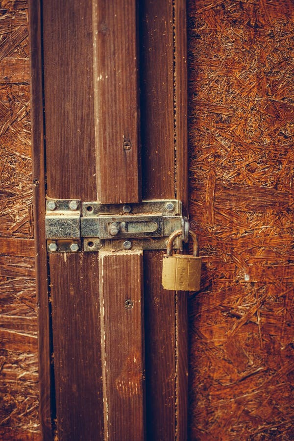 Latch and a Padlock on a Door Stock Image - Image of closed, latch ...