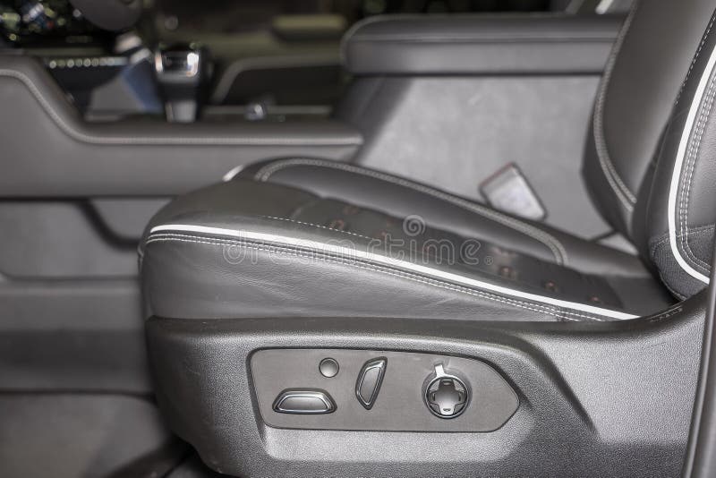 Leather Driver Seat Inside the Car with Automatic Seat Controls Stock ...