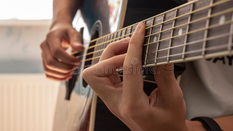 Close-up Shot of a Male Playing on a Guitar Stock Photo - Image of male ...