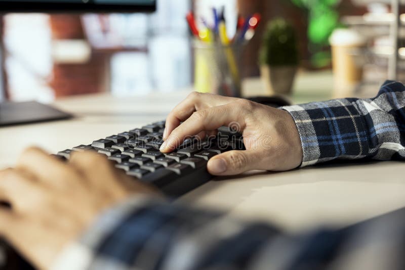 Close Up Shot of Man at Home Office Desk Using Computer, Typing on ...
