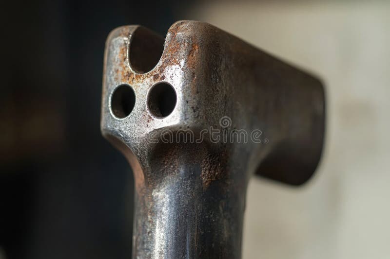 A Close-up Shot of a Metal Object Featuring Multiple Holes Stock Photo ...