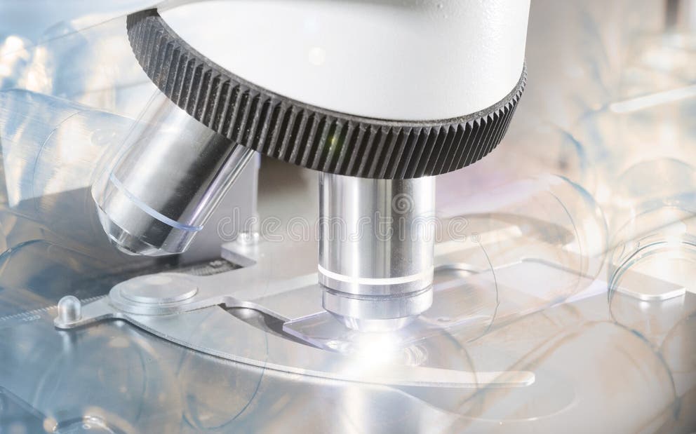 Close Up Shot of Microscope at the Blood Laboratory and Empty Capsules ...