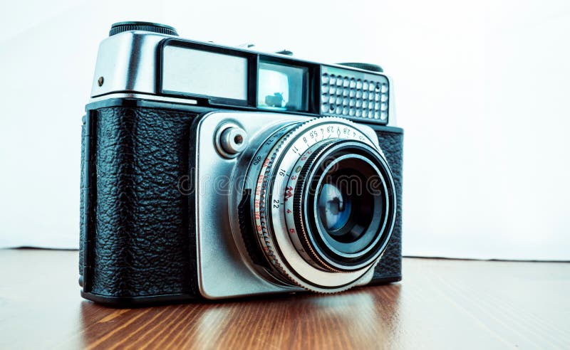 Close Up Shot of Old Photography Camera on the Table Against White ...