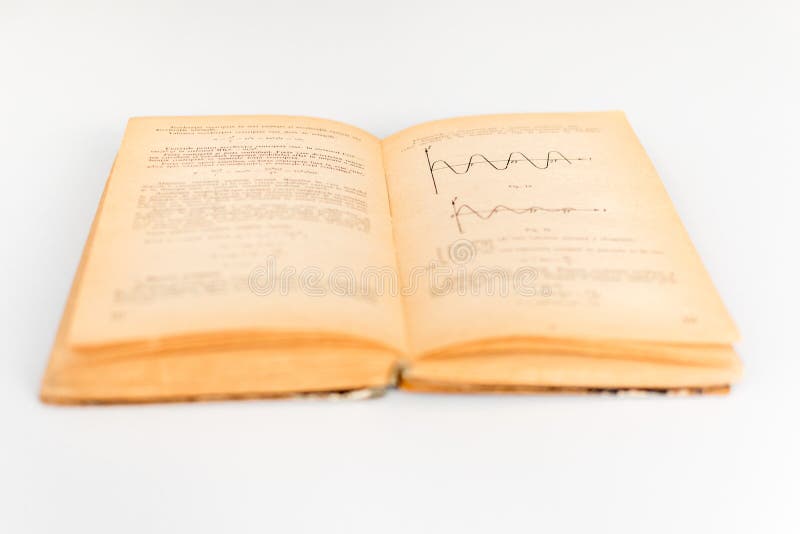 Close Up Shot of an Open Old Science Book Containing Equations and ...