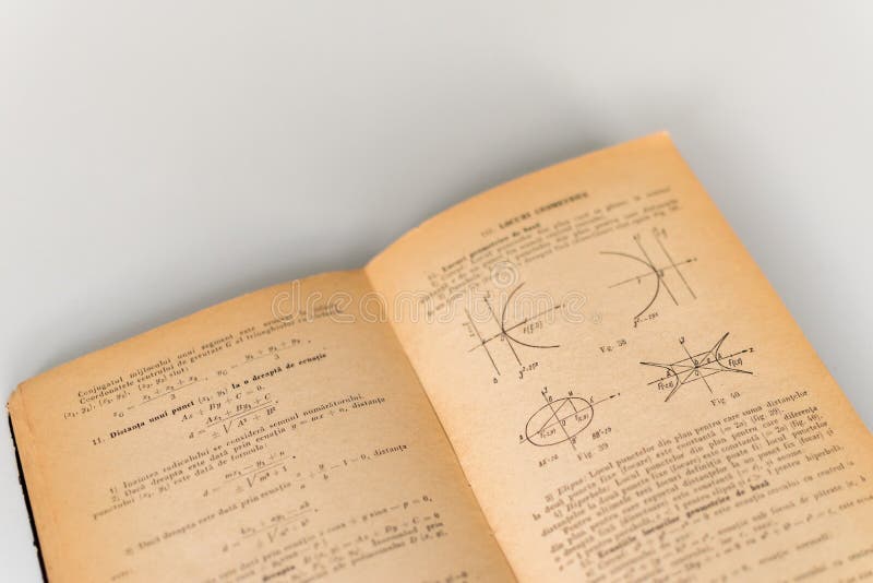 Close Up Shot of an Open Old Science Book Containing Equations and ...