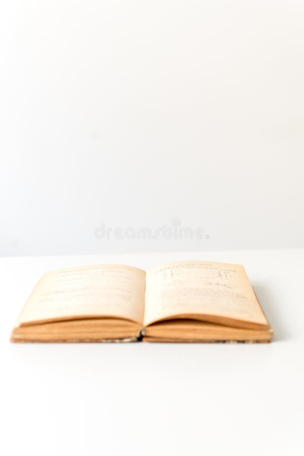 Close Up Shot of an Open Old Science Book Containing Equations and ...