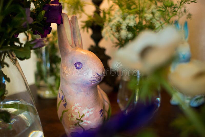 Little Hidden Ceramic Rabbit Surrounded by Flowers Stock Photo - Image ...
