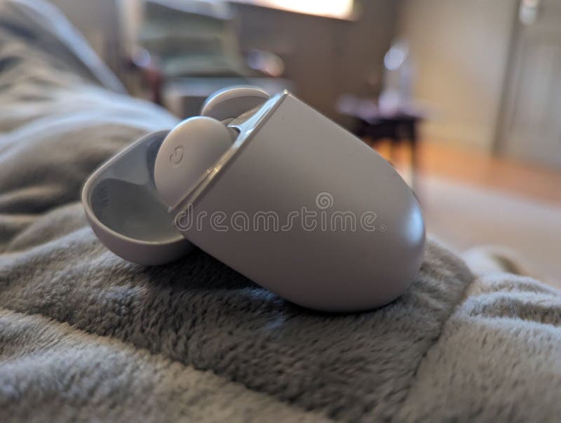 Close-up Shot of a Pair of Wireless Earbuds Editorial Photo - Image of ...