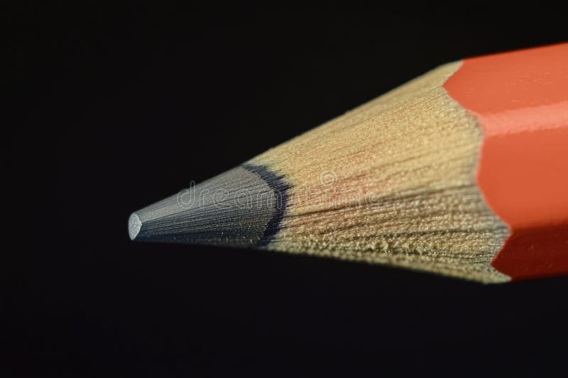 A Close-up Shot of a Pencil on a Dark, Matte Surface Stock Image ...