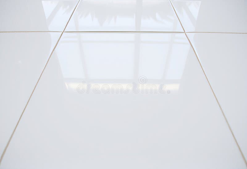 A Close Up Shot of a Polished Ceramic Tile Reflecting the Light Stock ...