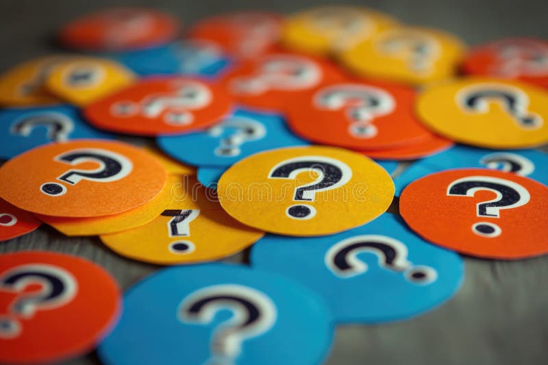 A Close-up Shot of Question Mark Buttons on a Wooden Table, Suitable ...