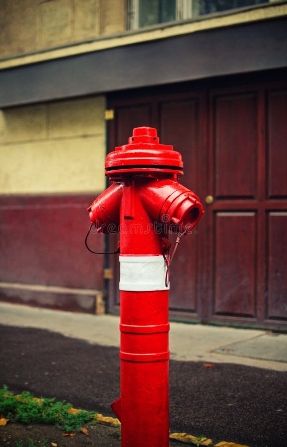 Red Fire Hydrant on a Sidewalk of a Street Stock Image - Image of hose ...