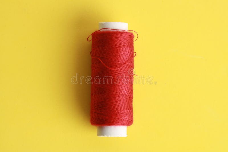 Close Up Shot of a Red Sewing Thread Stock Image - Image of stitch ...
