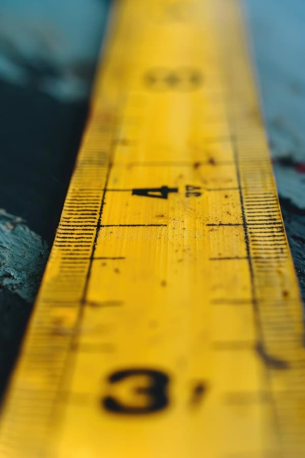 A Close-up Shot of a Ruler Lying Flat on a Table Stock Illustration ...