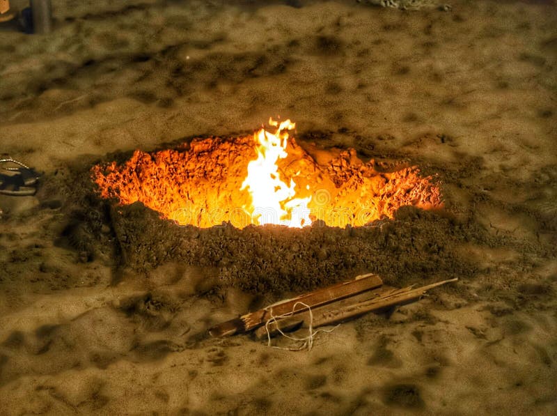 Close-up Shot of a Small Bonfire in the Sands Stock Image - Image of ...