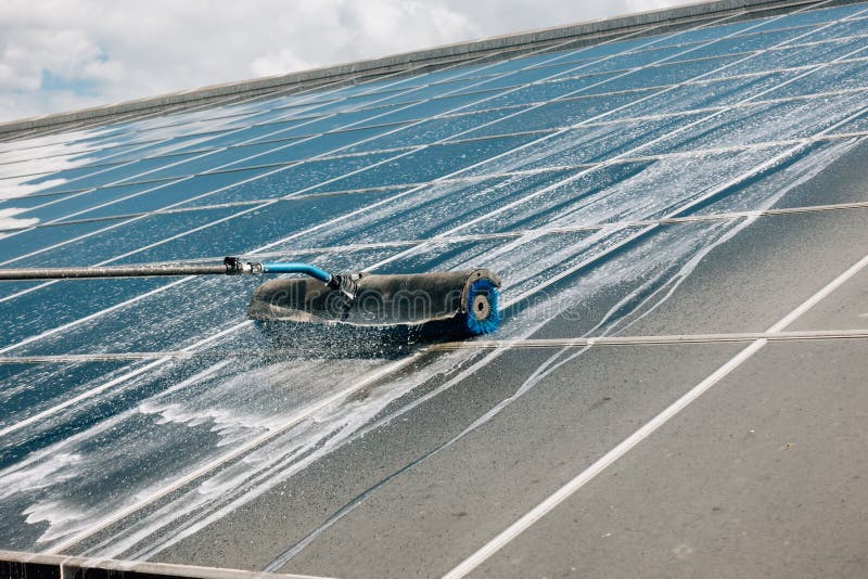 Close-up Shot of Solar System Panel Cleaning Process Stock Photo ...