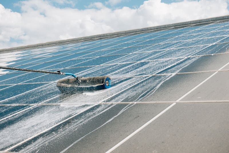 Close-up Shot of Solar System Panel Cleaning Process Stock Photo ...