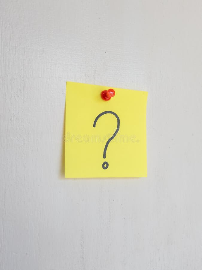 Yellow Sticky Note with a Question Mark Pinned on a White Wall Stock ...
