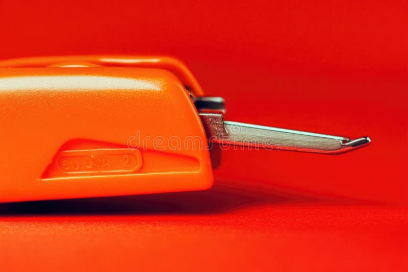 A Close-up Shot of a Stapler on a Red Surface Stock Image - Image of ...