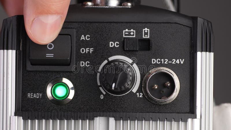 Switching on and Adjusting Studio Light Power. Stock Photo - Image of ...