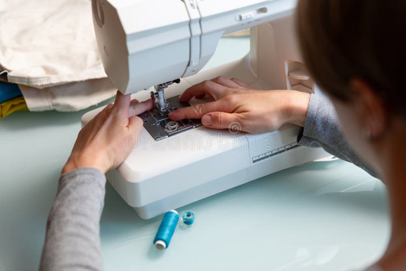 Close Up Shot of Tailor S Female Hands Preparing Sewing Machine Stock ...